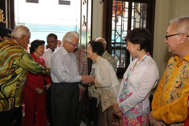 President Tony Tan and his wife Mrs Mary Tan being greeted