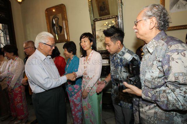 President Tony Tan being greeted by senior management and