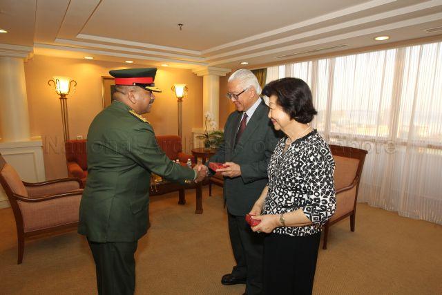 President Tony Tan and his wife Mrs Mary Tan, presenting a