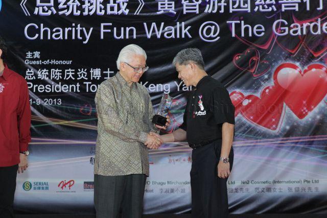 President Tony Tan presenting token of appreciation to