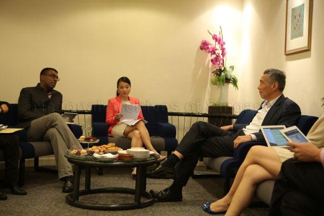 Prime Minister Lee Hsien Loong, (from left) Mediacorp Editor