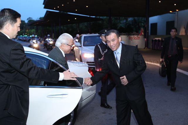 President Tony Tan being greeted by Chairman of Agency for