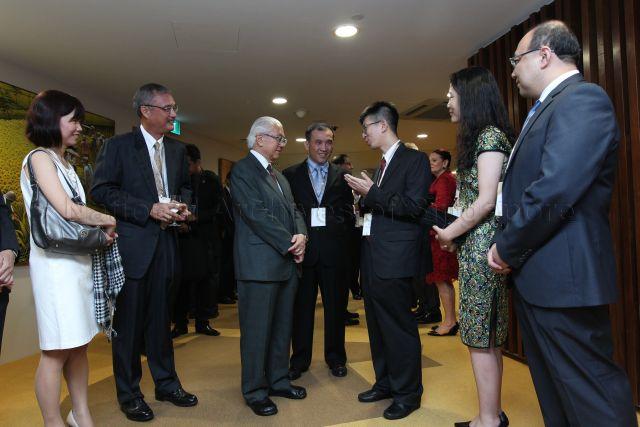 President Tony Tan conversing with (from right) Dr Ma Bin,