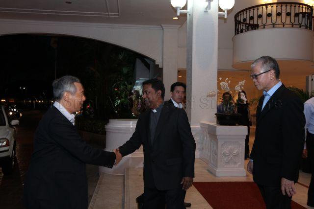 Prime Minister Lee Hsien Loong being greeted by Church of St