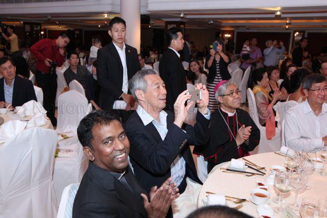 Prime Minister Lee Hsien Loong, (from left) Church of St