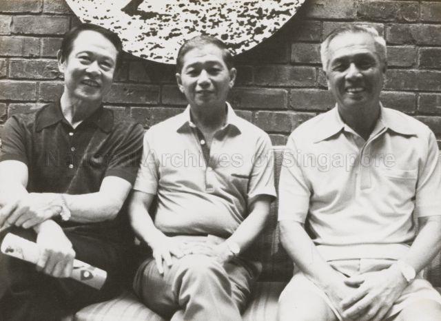 Group photograph of Chia Boon Leong and two other males