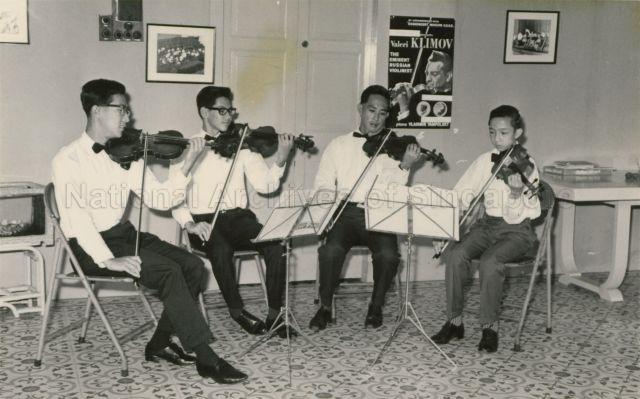 Violin students of Goh Soon Tioe practising for the Benefit