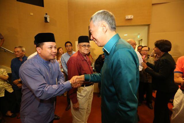 Prime Minister Lee Hsien Loong with guests at the auditorium