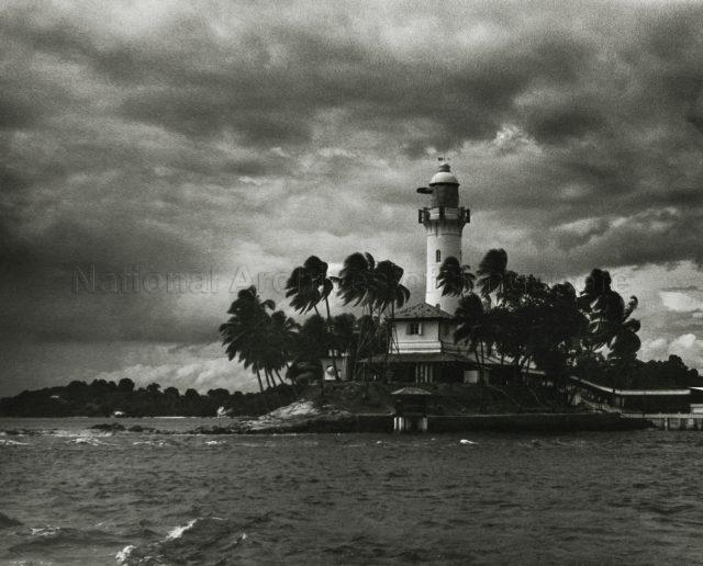 Raffles Lighthouse under heavy rain clouds. It was