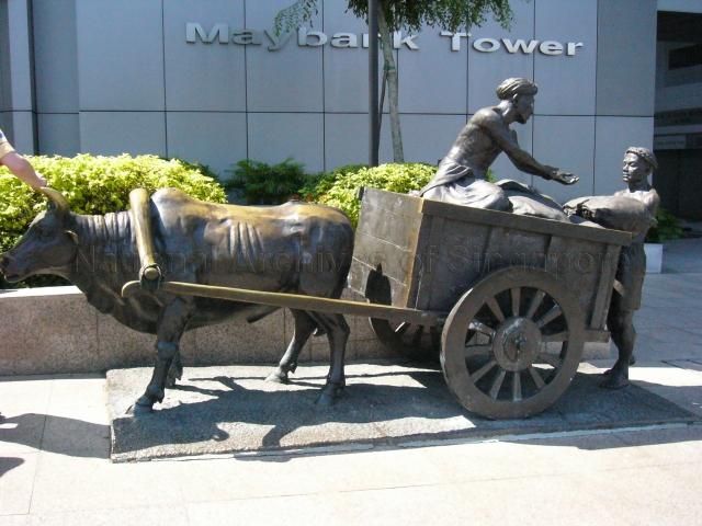 The River Merchants sculpture by Aw Tee Hong situated along