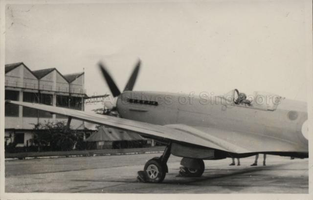 Side view of Spitfire aircraft MK19, PS888 at Changi airbase