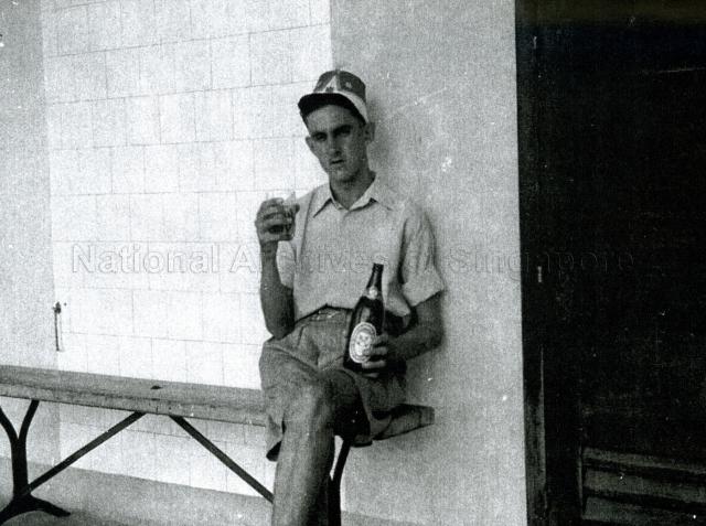 Photograph of Corporal Percy Ralph Witt enjoying a bottle of