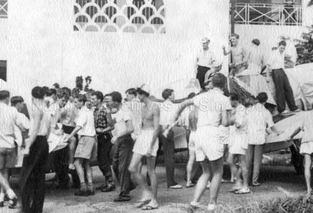 Photograph of a group of airmen exploring the Supermarine