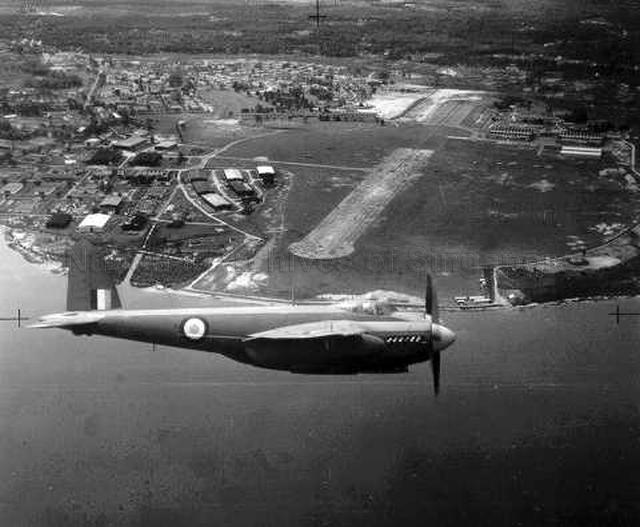 Photograph of Mosquito flying over RAF Seletar