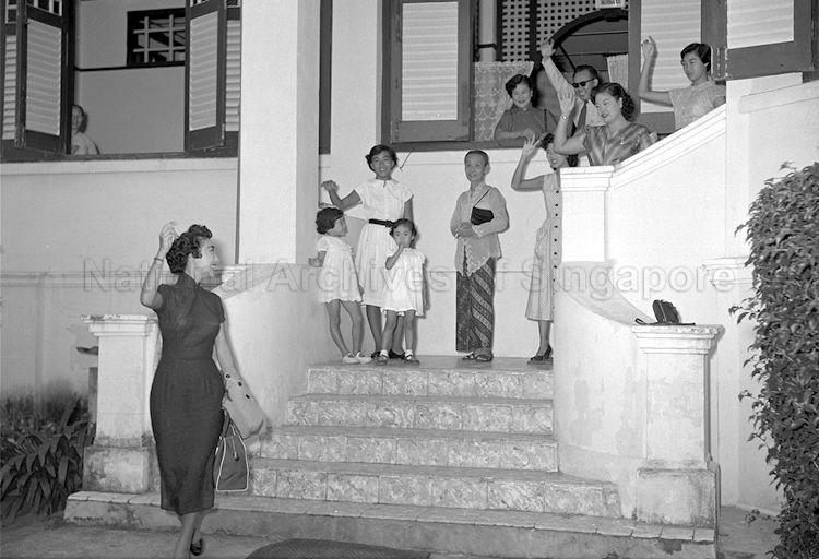 MISS MARJORIE WEE, WHO IS THE MISS MALAYA WAVES TO HER