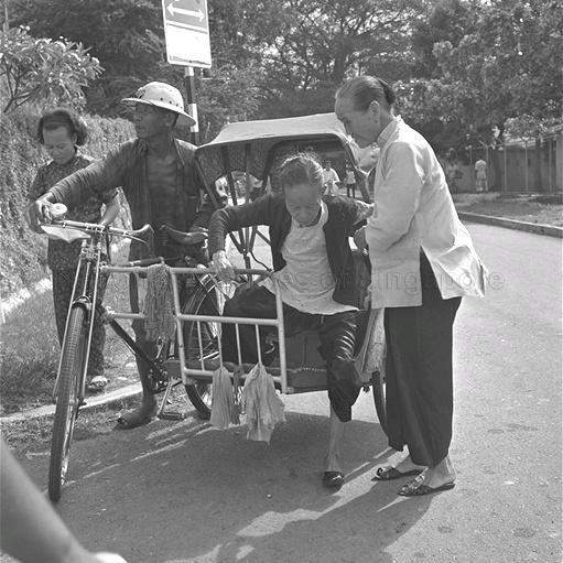 An elderly voter arriving at Tanjong Pagar Community Centre