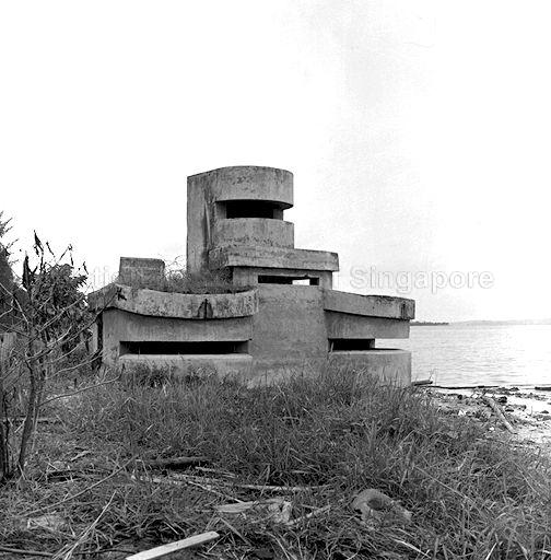 DEMOLISHING OF OLD 'PILL BOXES' ALONG CHANGI BEACH