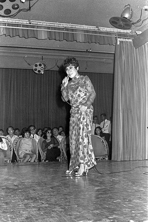 MISS CHANG LOO PERFORMING AT THE OPENING OF THE PEARL OPERA
