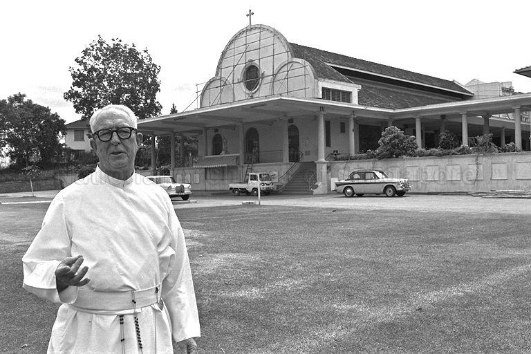FORMER PRISONER-OF-WAR FATHER JOHN MORAN AT NOVENA CHURCH,