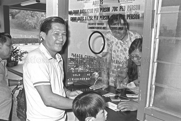 FORMER SINGAPORE SOCCER CAPTAIN LEE KOK SENG, BUYING TICKETS