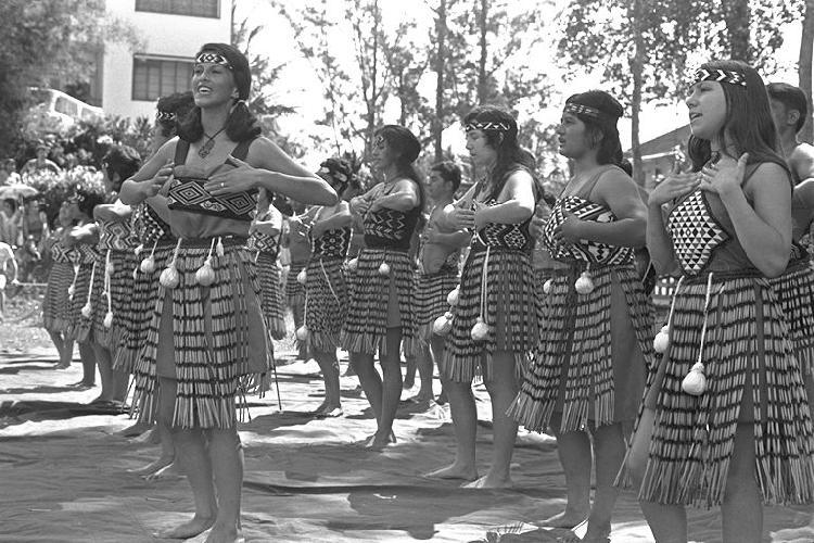 THESE COMELY MAORI MAIDENS DOING A TRIBAL DANCE WERE THE