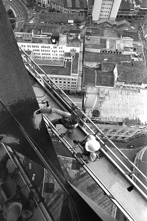 THESE WORKERS HAVE BEEN SCALING UP AND DOWN THE 28-STOREY