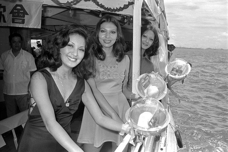 GUESTS ON BOARD THE PSA FERRY, SEA HAWK, WITH THREE OF THE